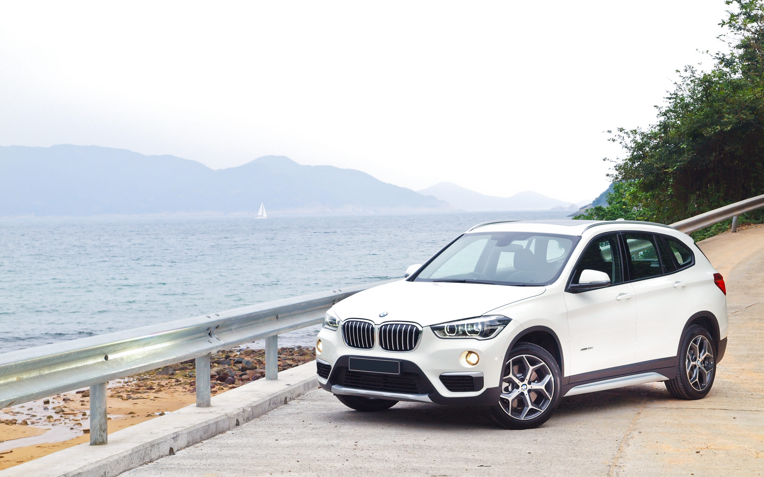 BMW X1 vs Ford Laser - Features & Specs Comparison | CarsGuide