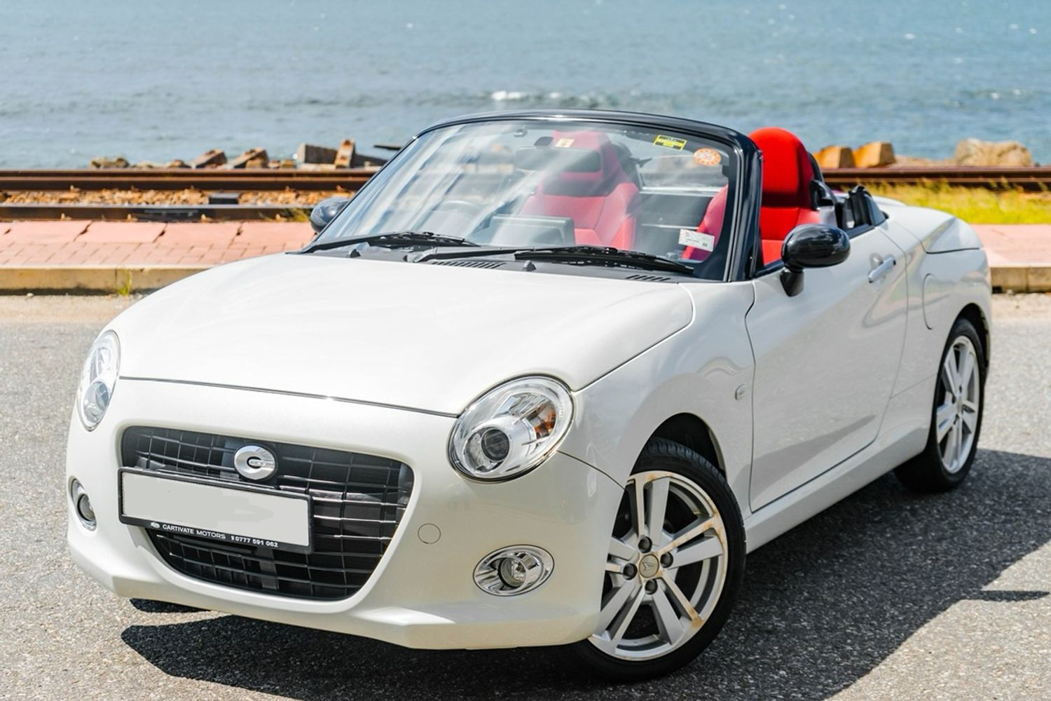 Micro Rexton vs Daihatsu Copen - Features & Specs Comparison | CarsGuide